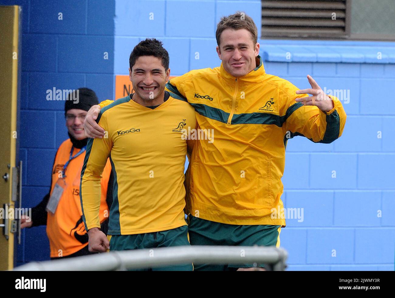 Wallabies players Anthony Faingaa (l) and James Horwill (r) smile as ...