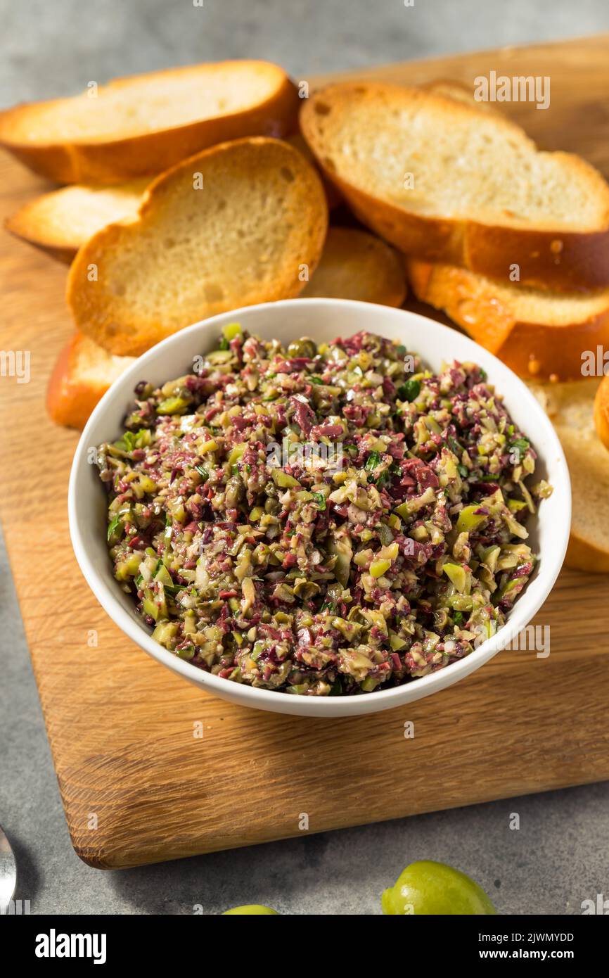 Homemade Mixed Olive Tapenade Appetizer with Toasted Bread Stock Photo ...
