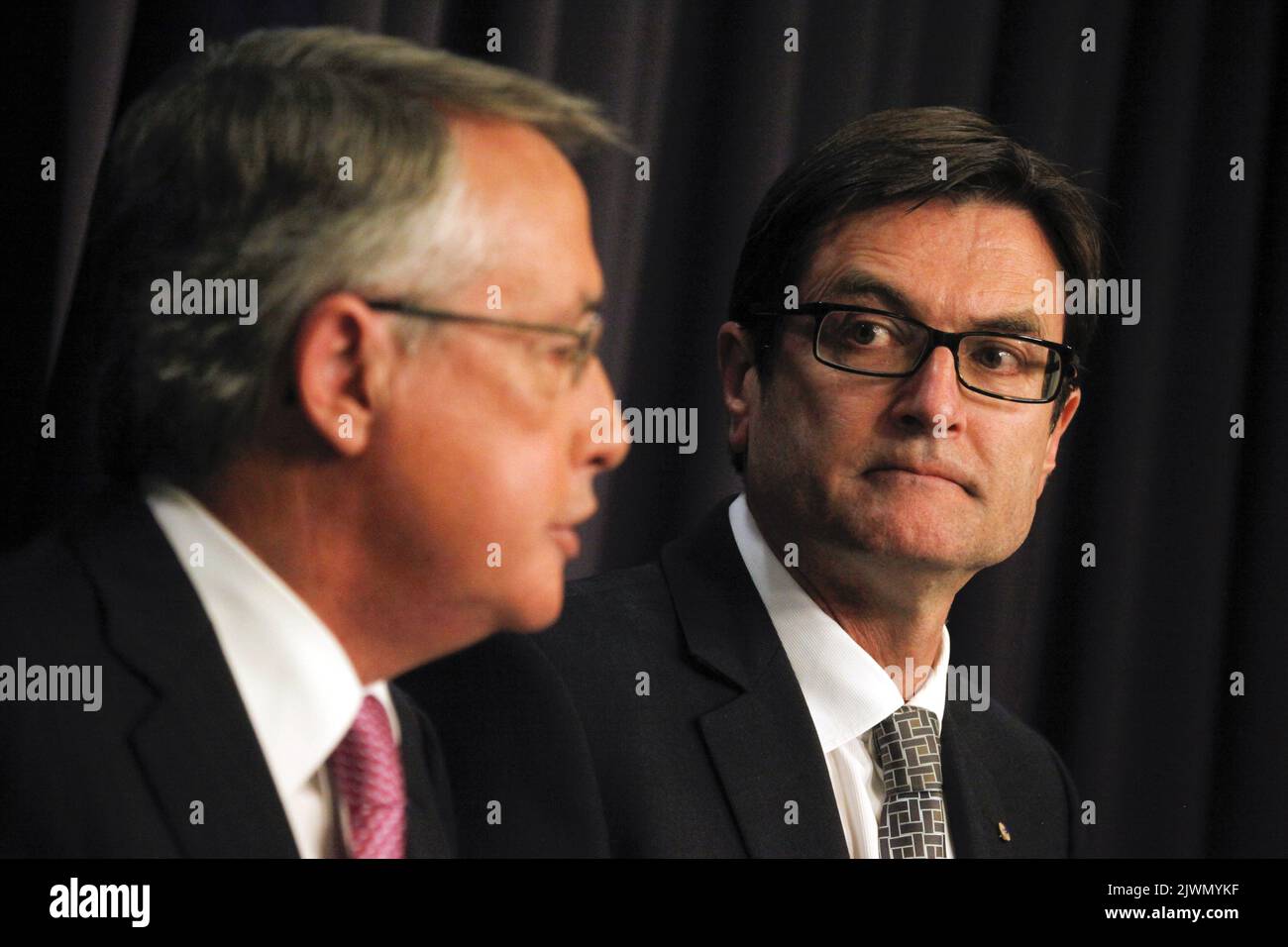 Minister for Climate Change Greg Combet (right) listens to Federal ...