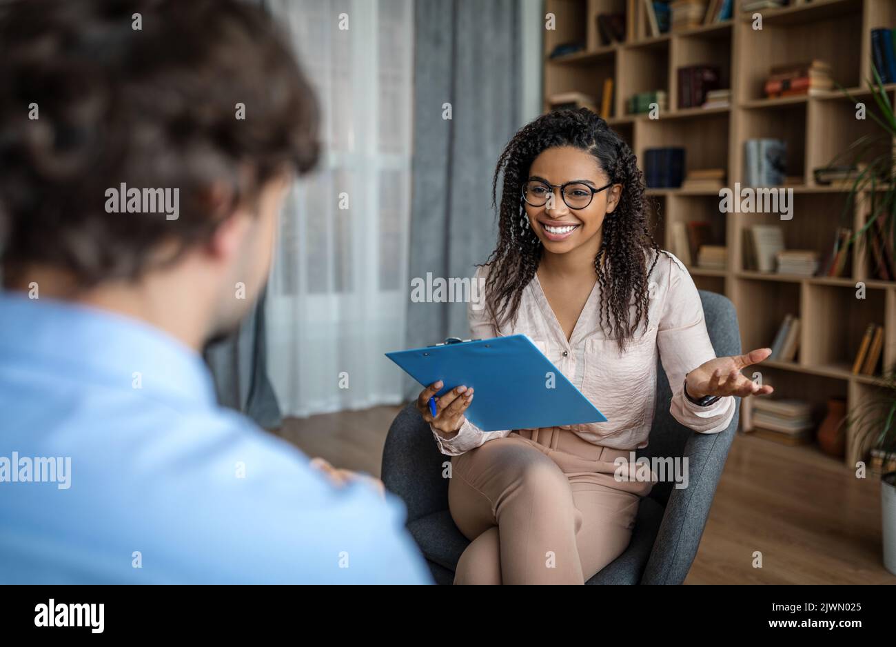 Psychological therapy. Cheerful pretty young african american female ...