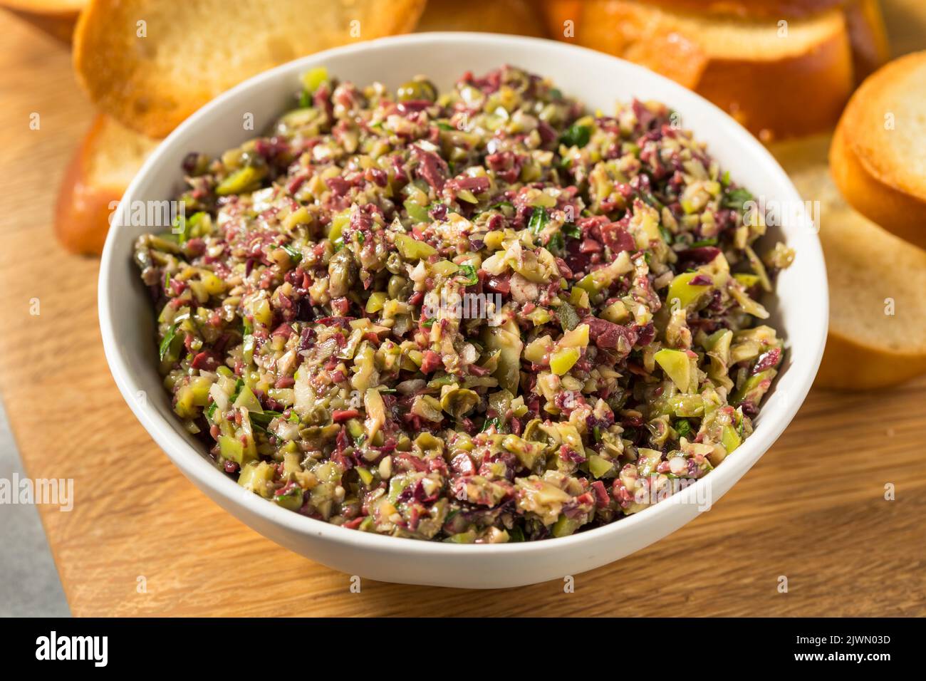 Homemade Mixed Olive Tapenade Appetizer with Toasted Bread Stock Photo ...