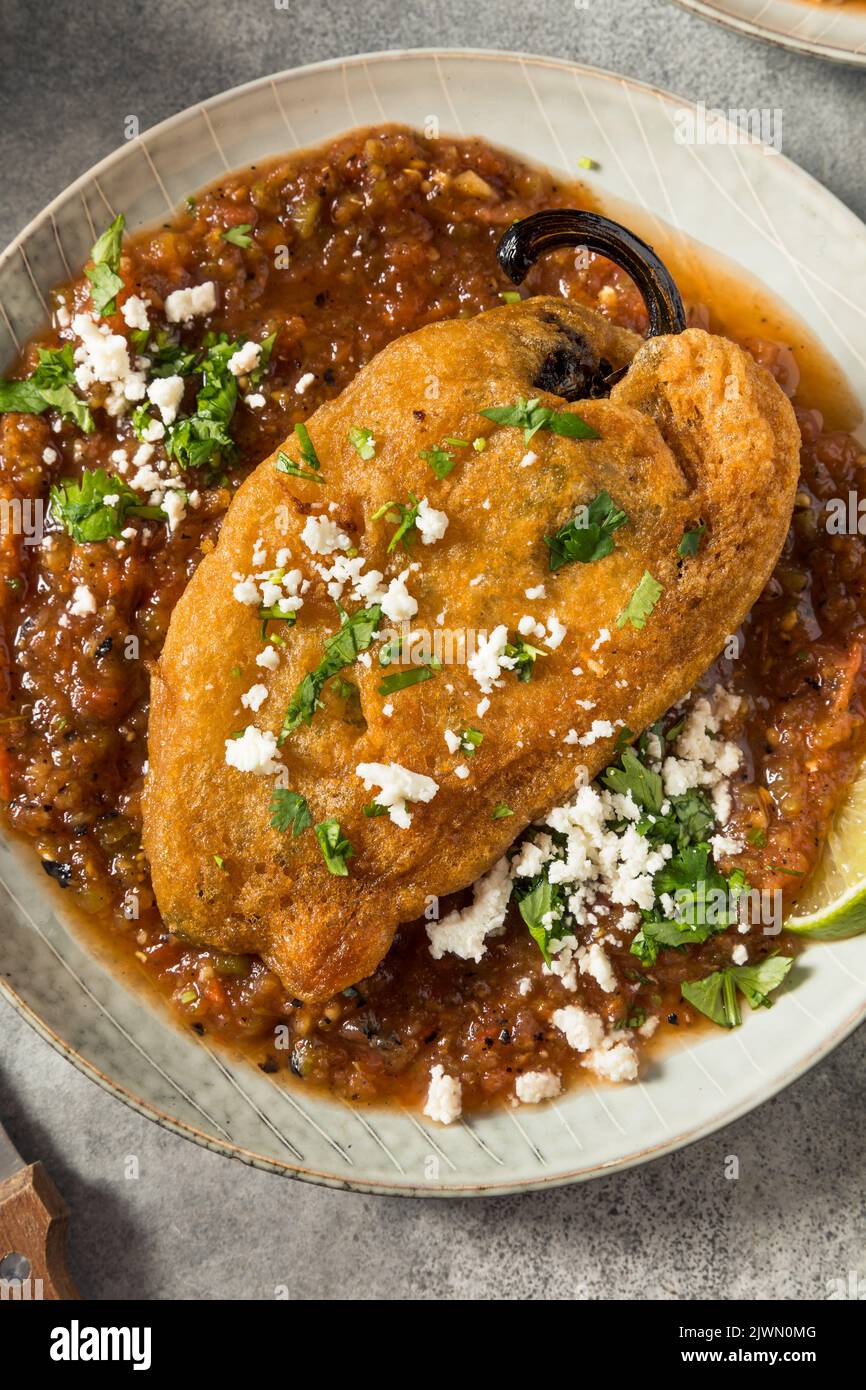 Homemade Fried Poblano Chili Relleno Stuffed with Cheese Stock Photo ...