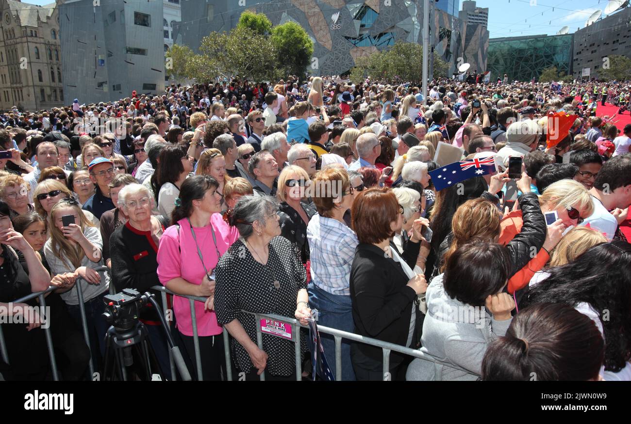 A large crowd waits to greet Queen Elizabeth II in Melbourne's ...