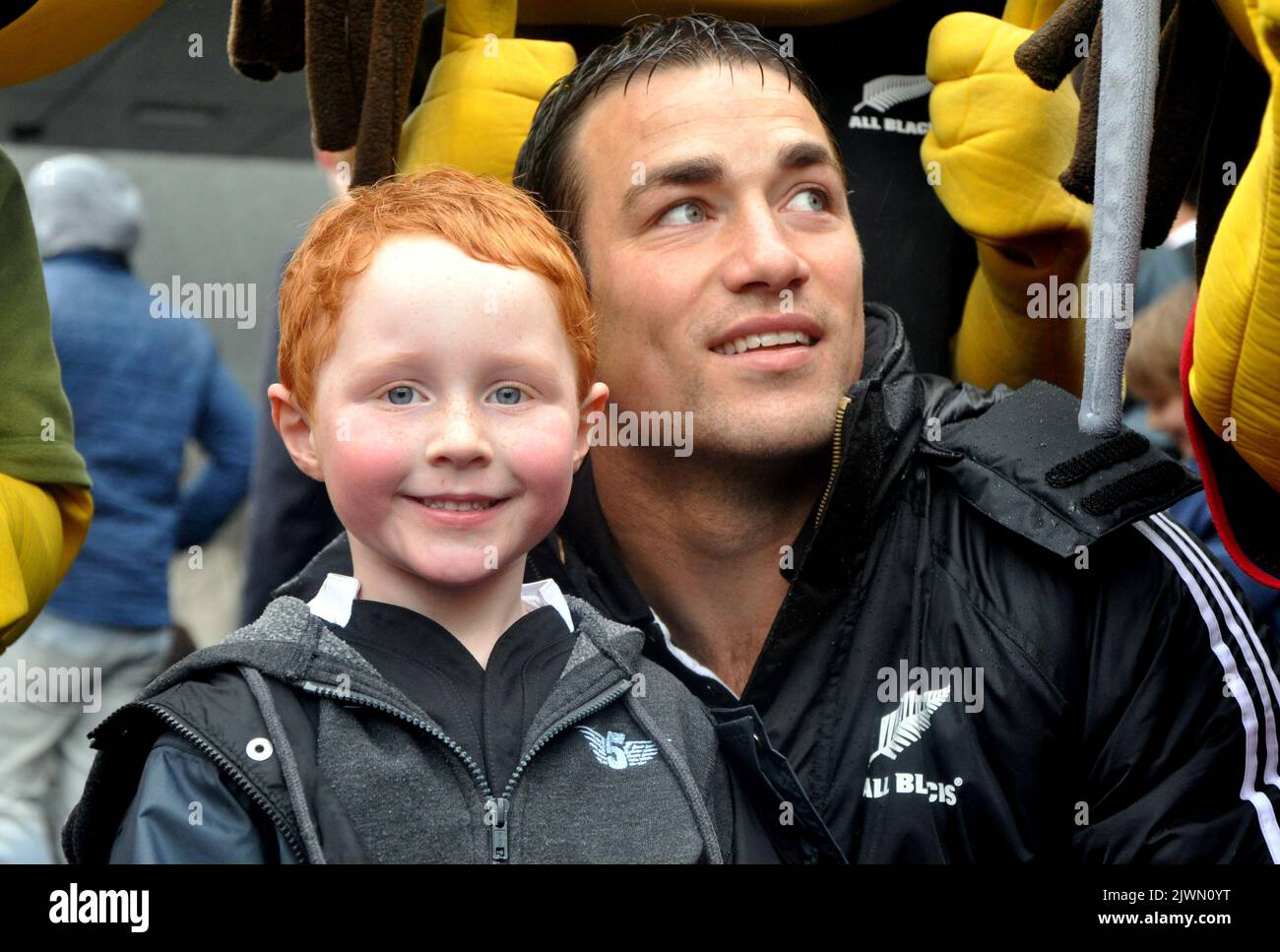 All Black fan Mylo Guthrie-Thiel, 4, with All Black Richard Kahui, as ...