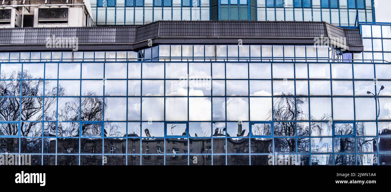 Reflective glass on modern building Stock Photo - Alamy