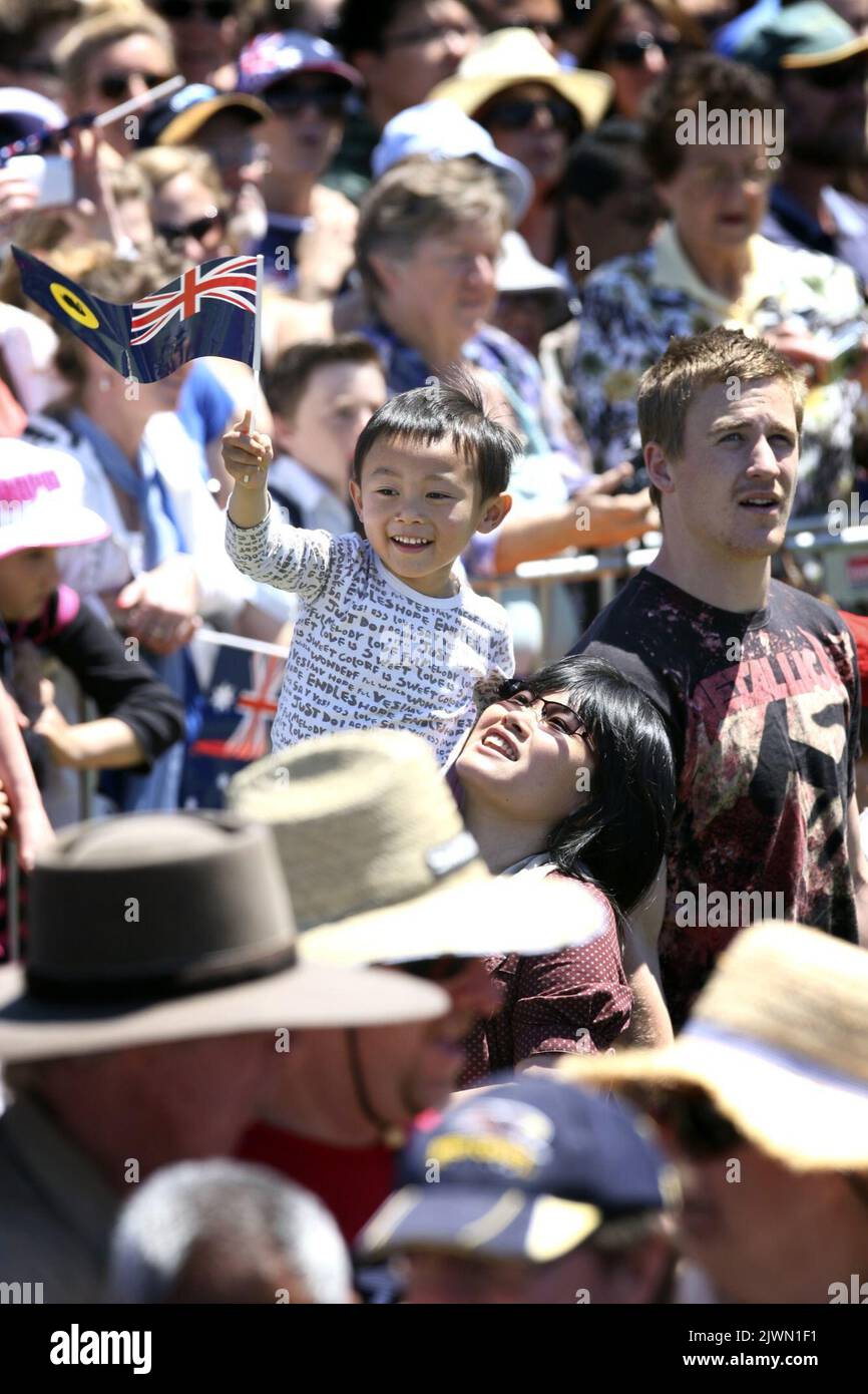 A child waves the royal flag at the Great Aussie Barbecue in Perth ...
