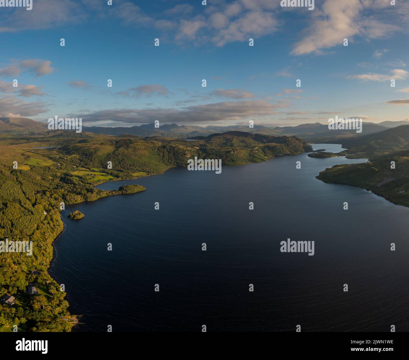 A view of Lough Caragh lake in the Glencar Valley of Kerry County in ...