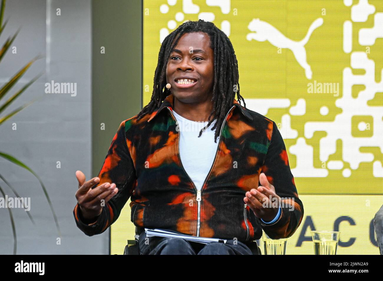 EDITORIAL USE ONLY Presenter Ade Adepitan appears on a panel during the ...