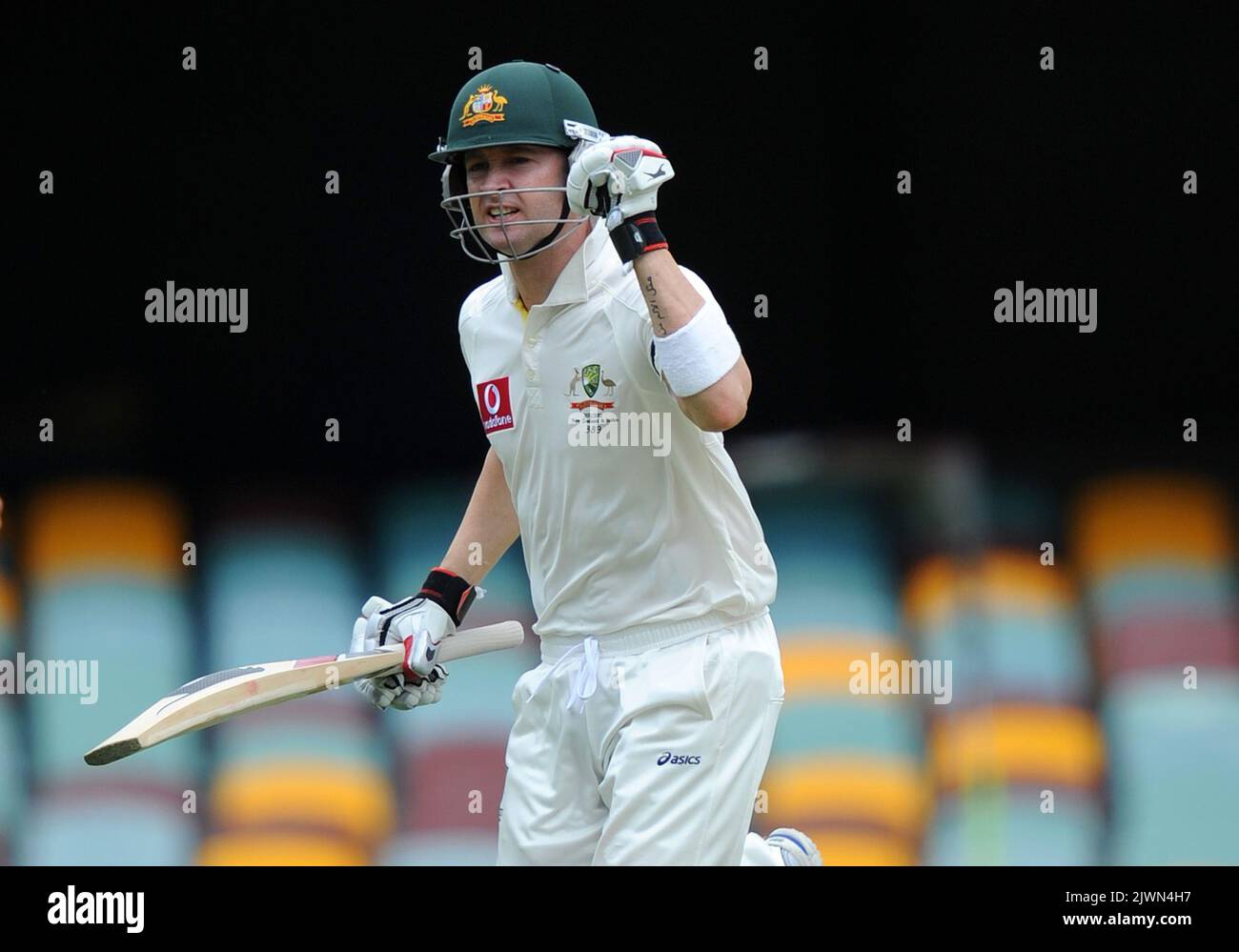 Australian captain Michael Clarke celebrates after reaching his century ...
