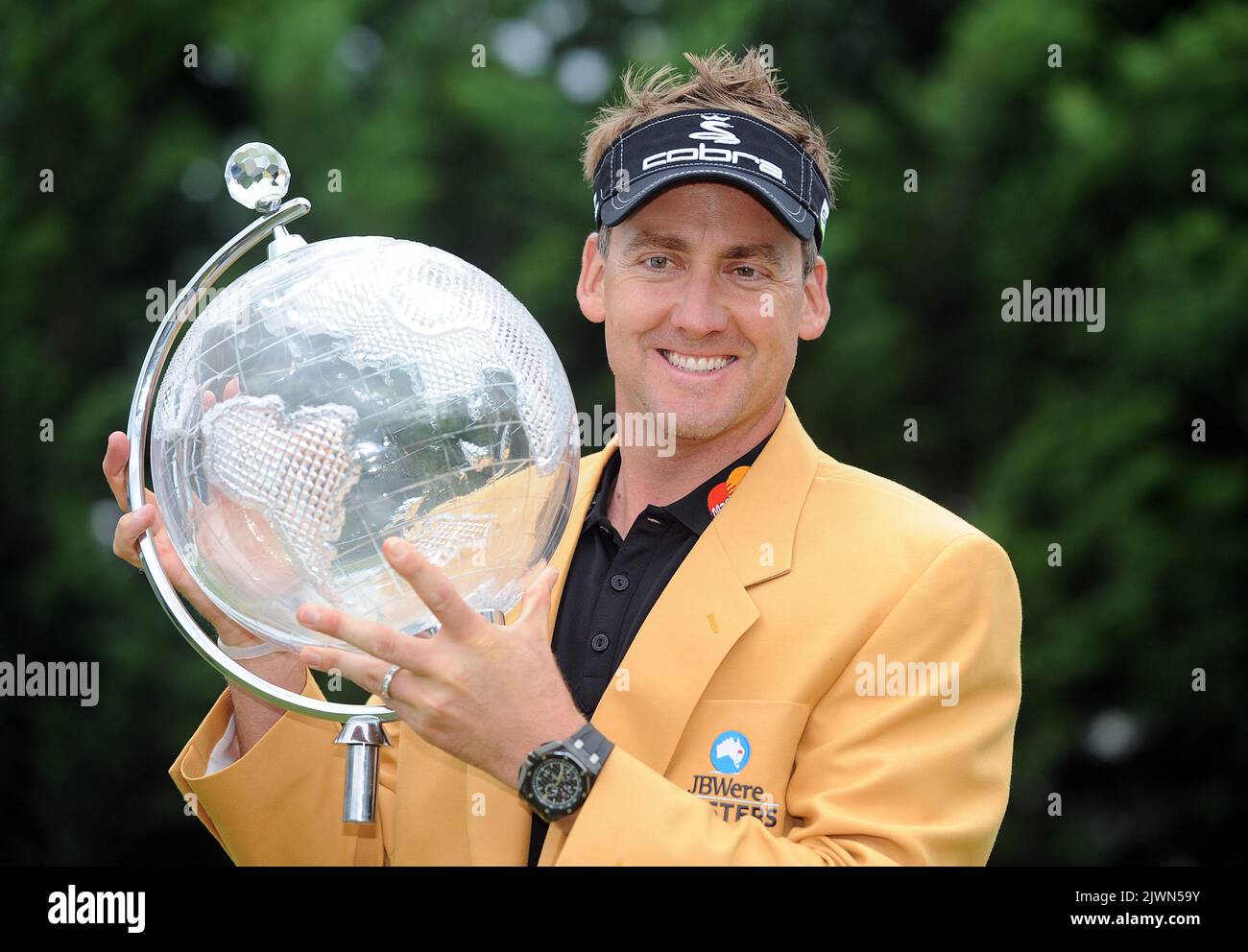 English golfer Ian Poulter holds the winners trophy after winning the ...