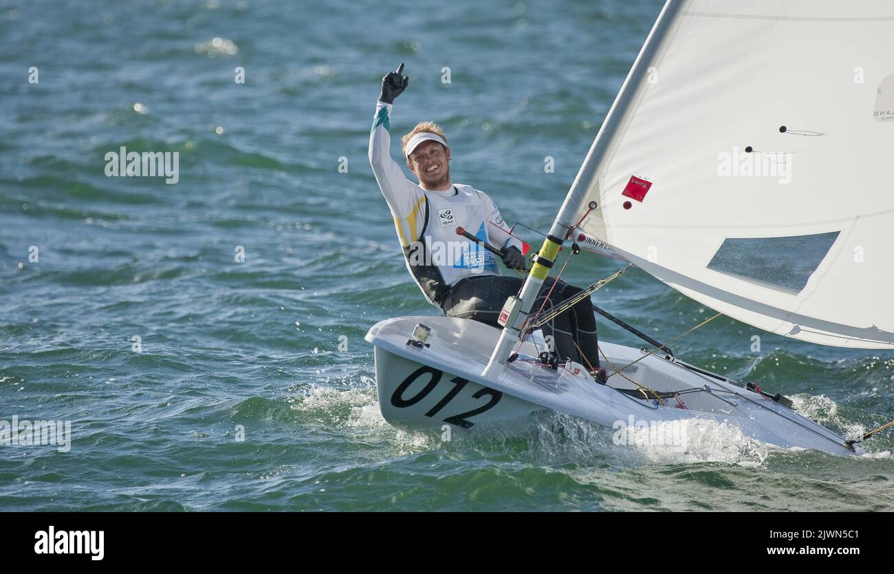 Tom Burton for Australia during the Laser Medal race off the coast of ...