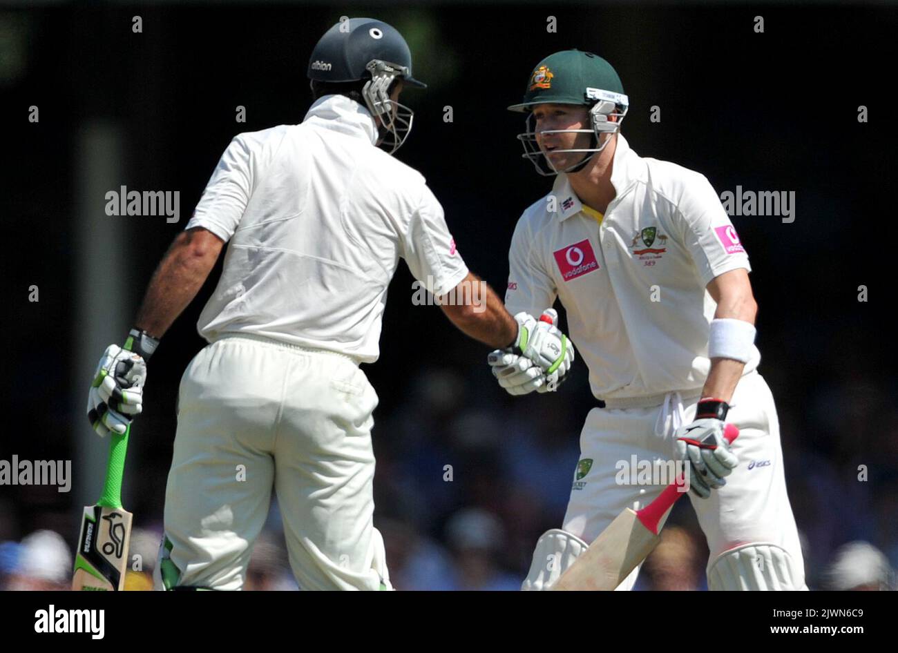 Australia's Michael Clarke (right) is congratulated by Ricky Ponting ...