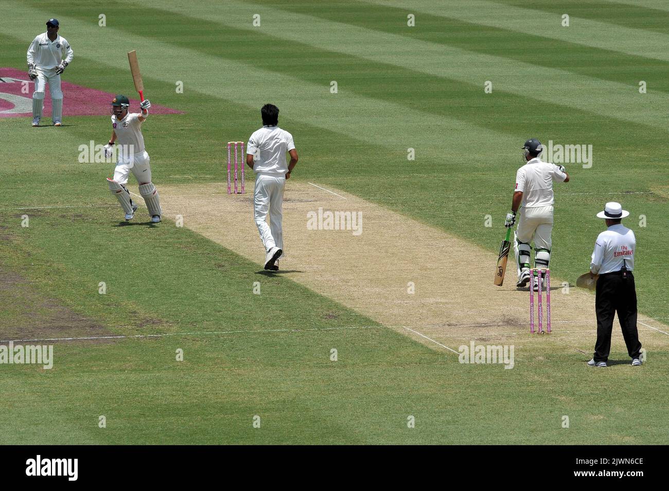Australia's Michael Clarke (2nd left) celebrates scoring a century on ...