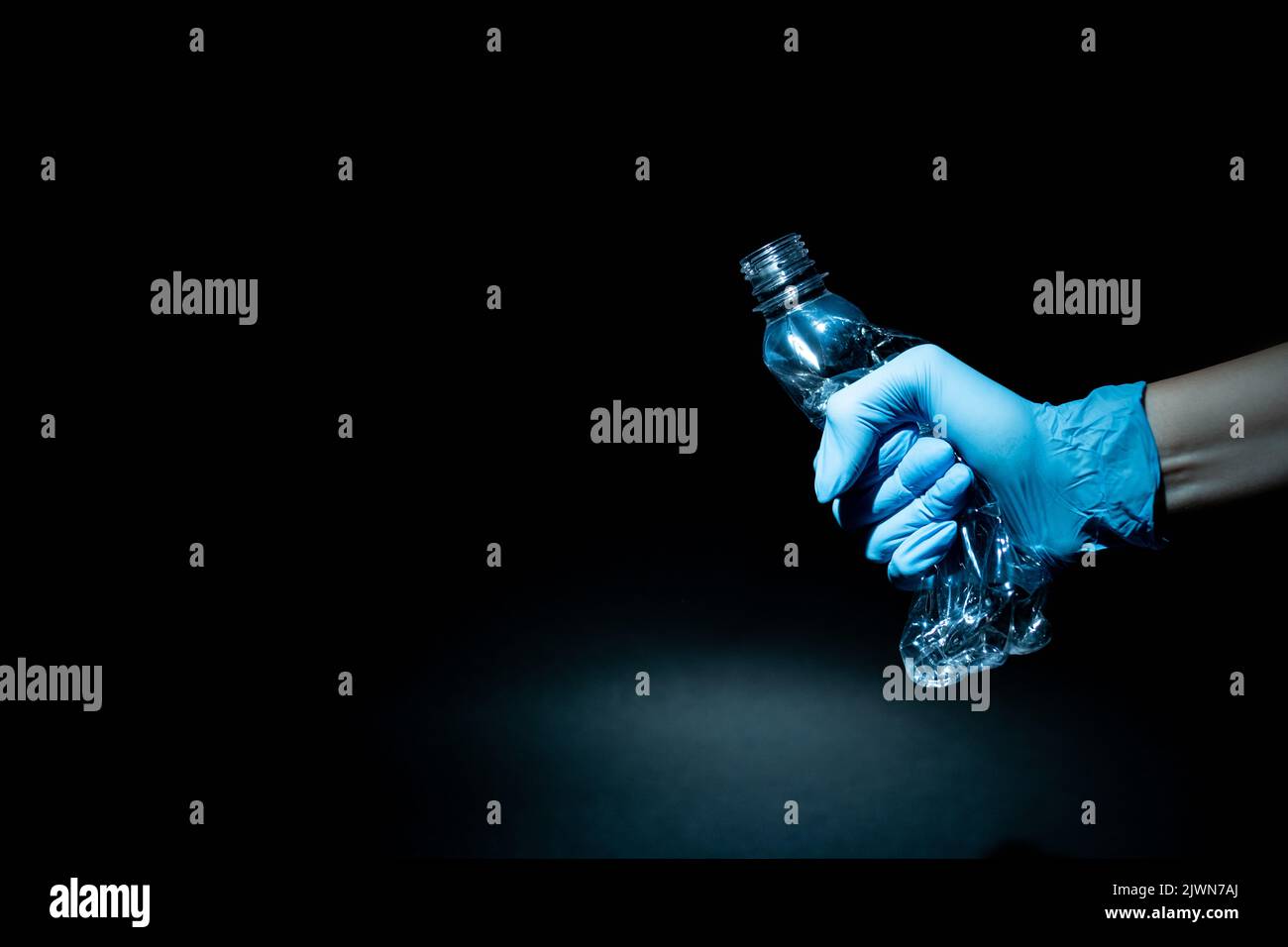 waste reduction plastic recycling hand used bottle Stock Photo - Alamy