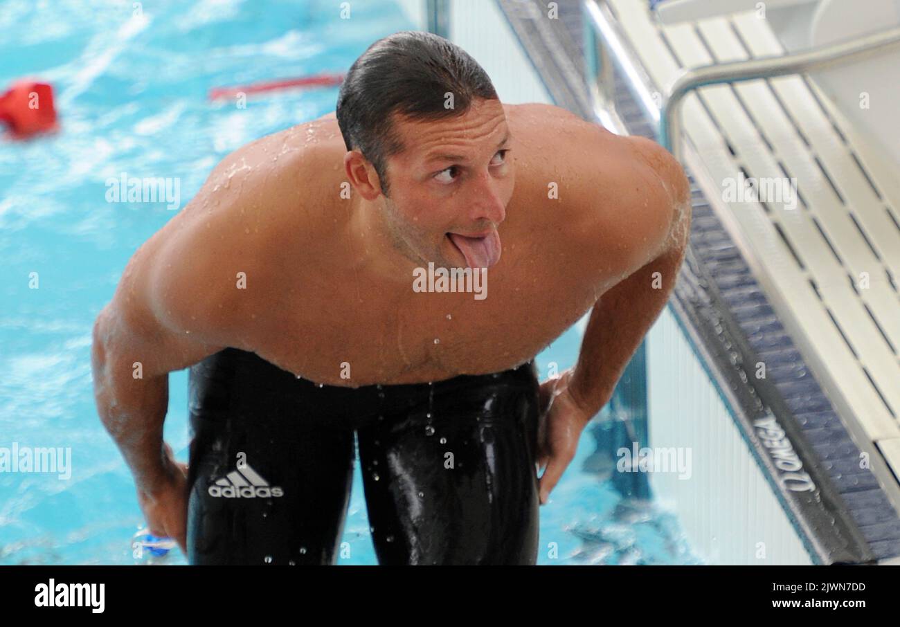 Ian Thorpe reacts while leaving the pool after failing to qualify for ...