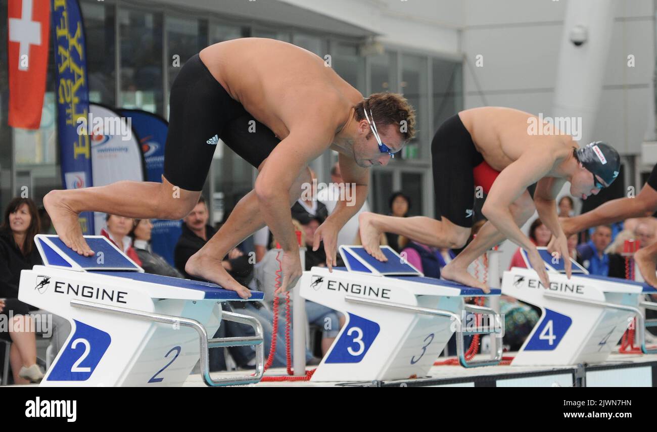 Ian Thorpe diving into the pool in his heat to qualify for the final of ...