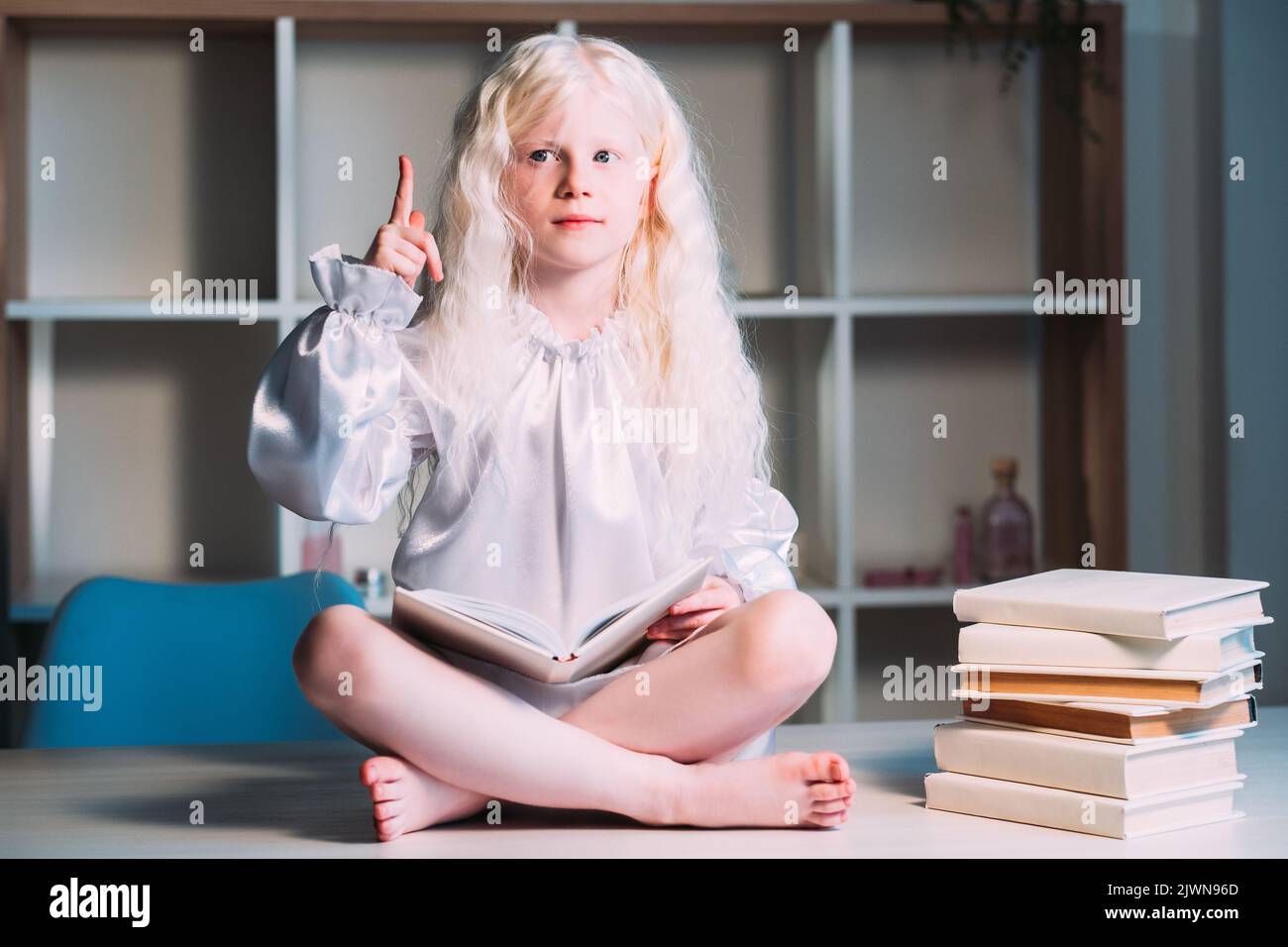 wonder kid discovery insight inspired girl book Stock Photo - Alamy