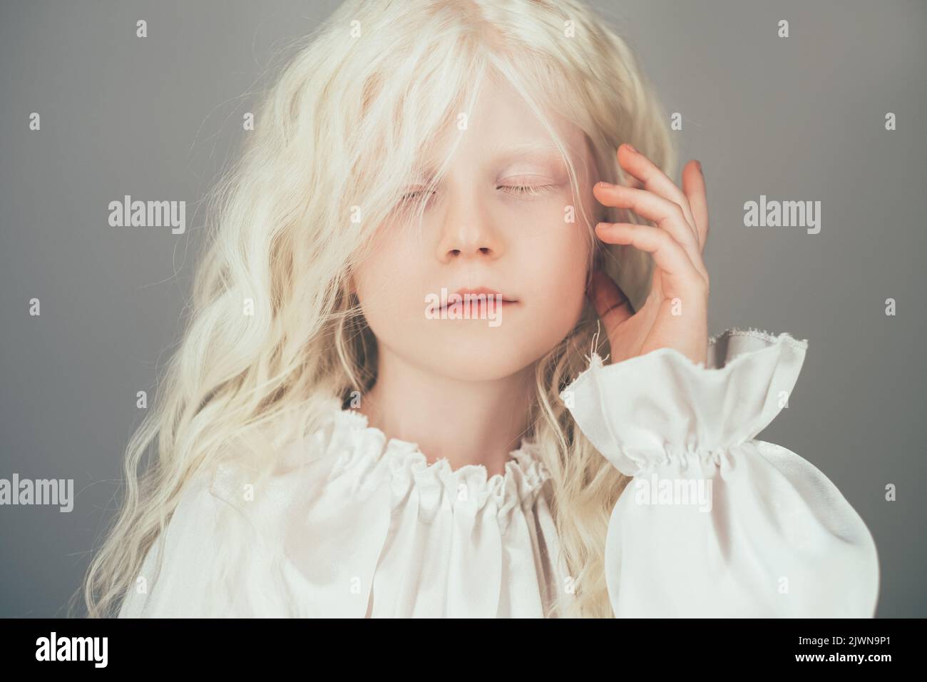 blonde little girl angel beauty child purity cute Stock Photo - Alamy