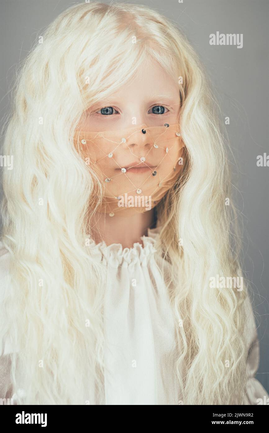 child carnival kid vintage look blonde girl mask Stock Photo - Alamy