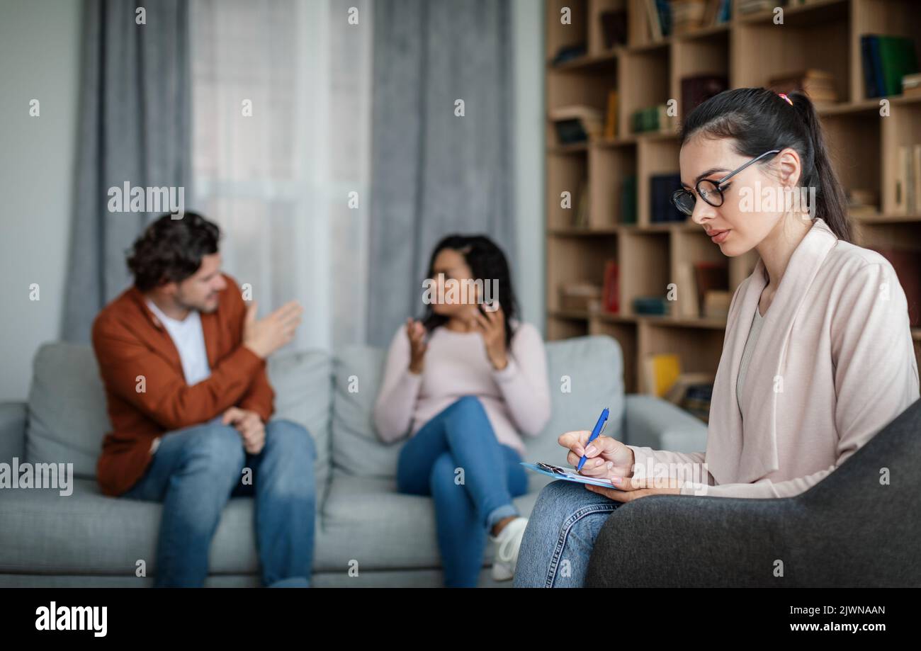 Angry international couple quarrel on consultation with european ...