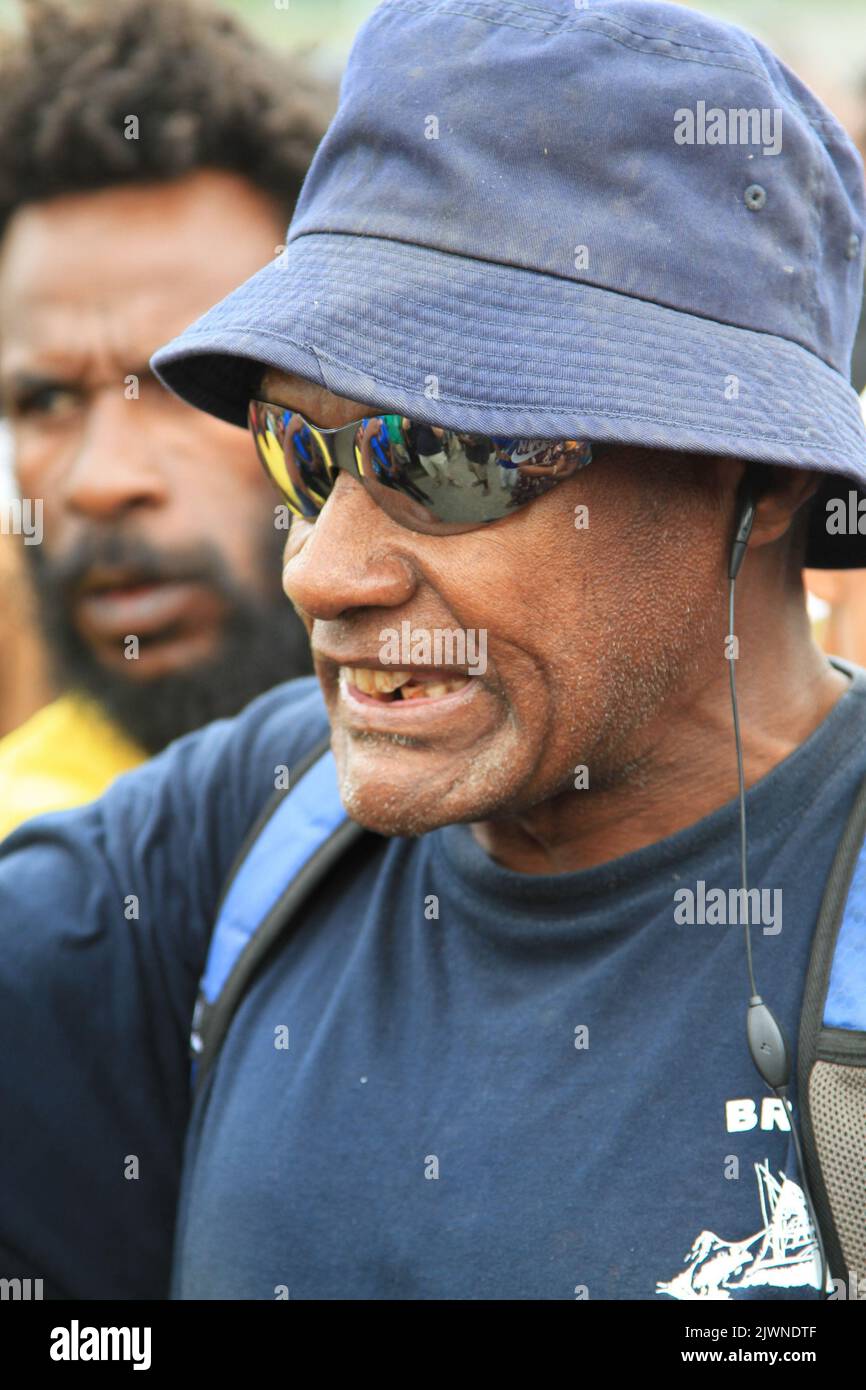 A Papua New Guinean man vents his anger outside on Angau hospital in ...