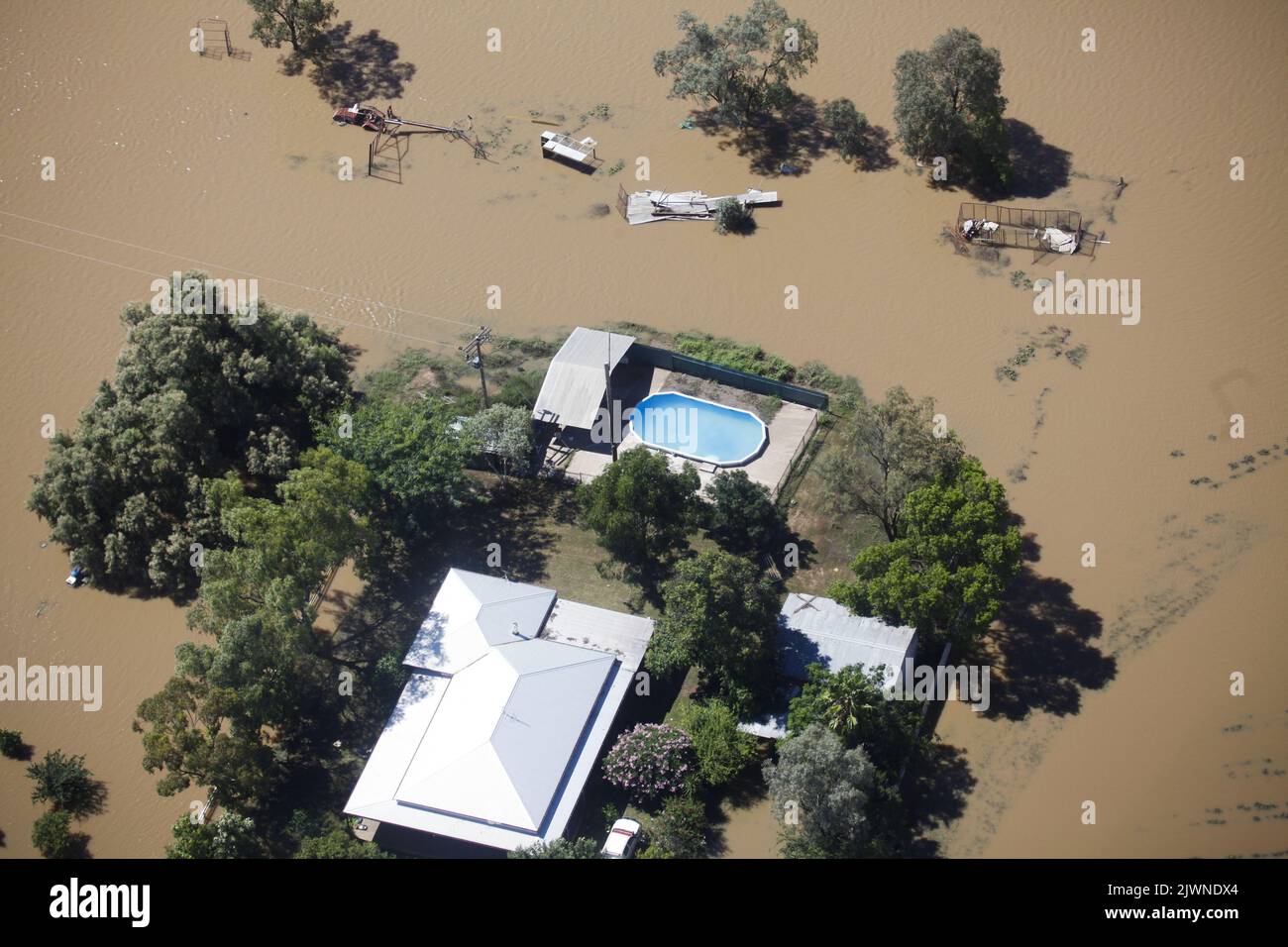 Flood affected properties seen from a helicopter between Moree and by ...