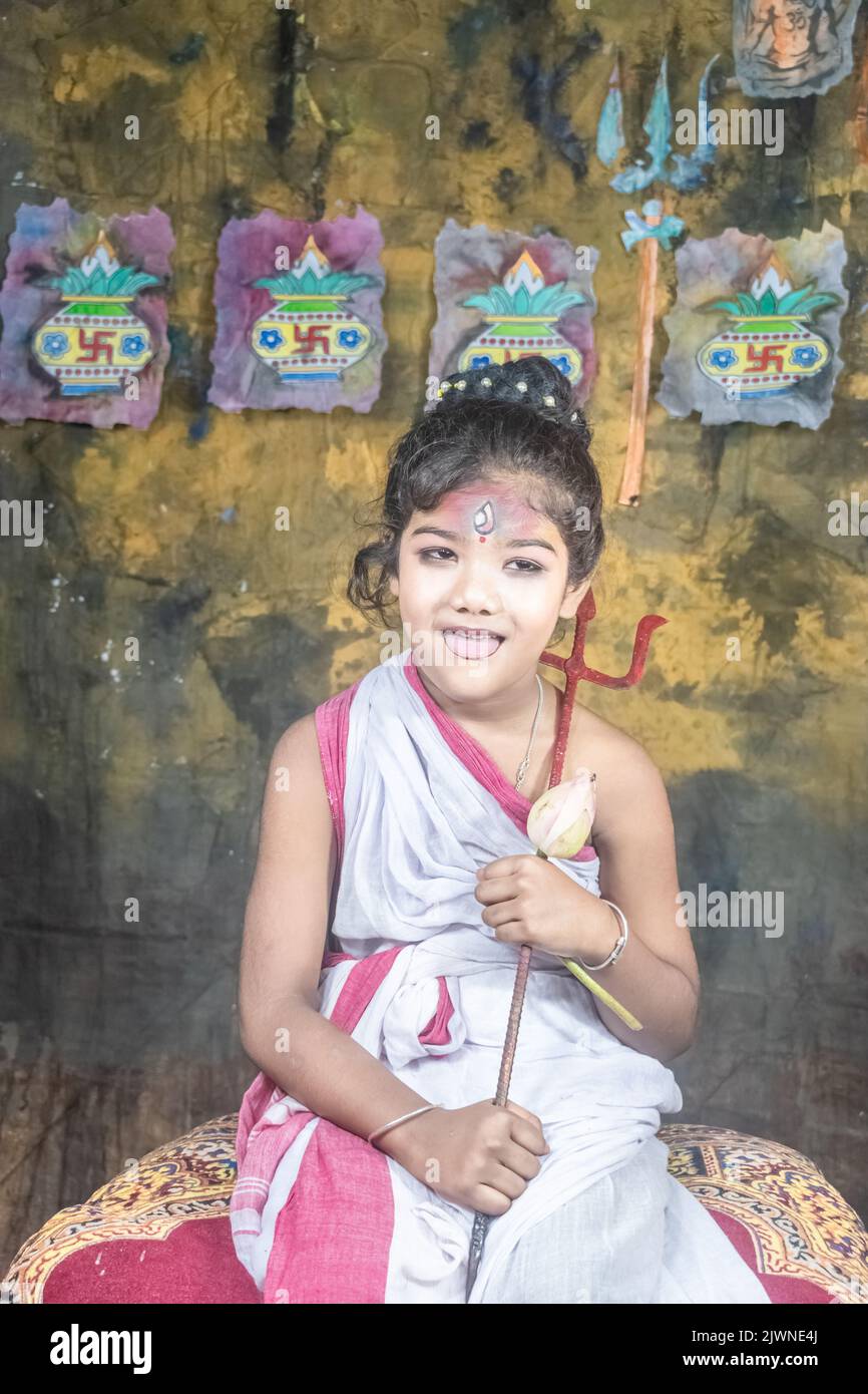Cute Baby in Goddess Durga,Agomoni concept photo shoot Stock Photo - Alamy