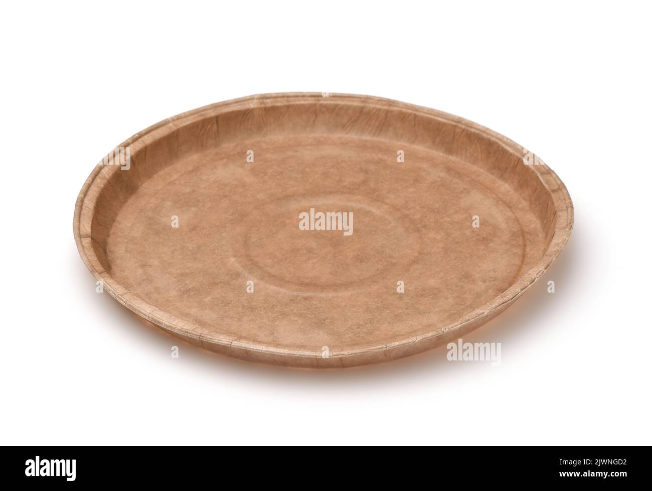 Empty round disposable brown paper cake baking tray isolated on white ...