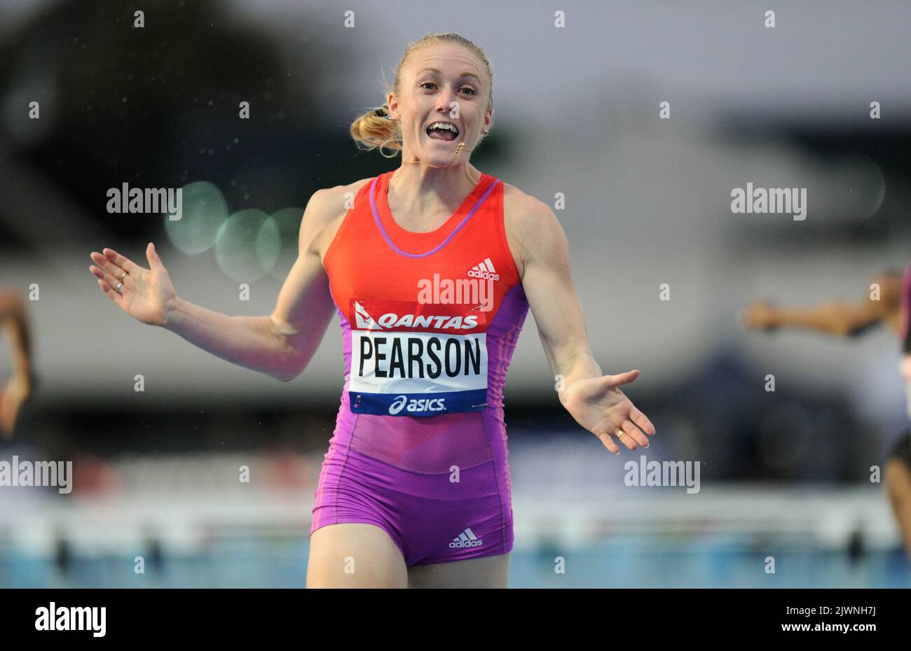 Sally Pearson of Australia reacts after winning the Womens 100 metre ...