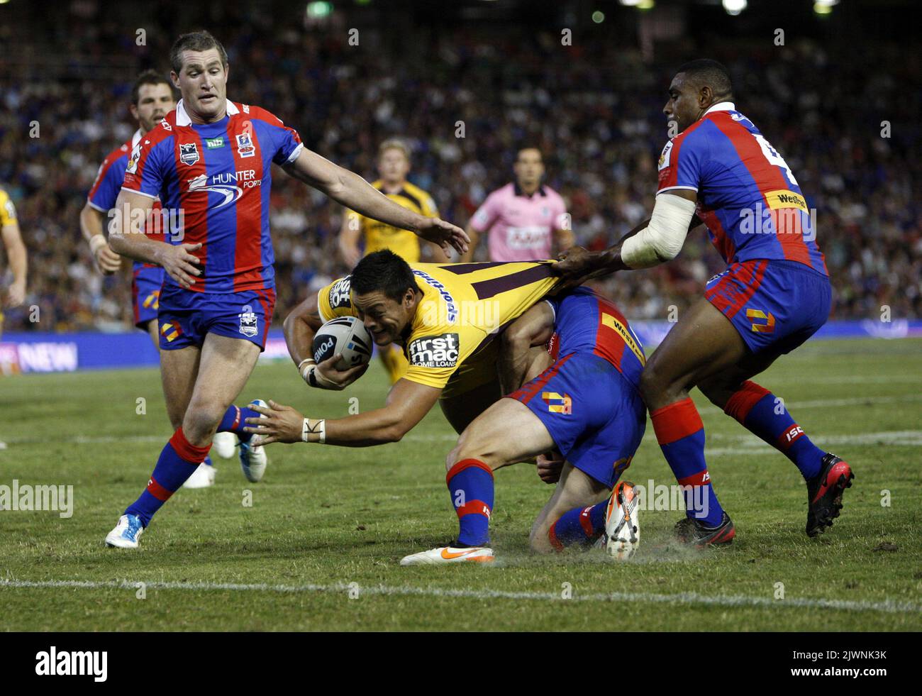 Alex Glenn reaches out for a try during the NRL Round 3 between Knights ...
