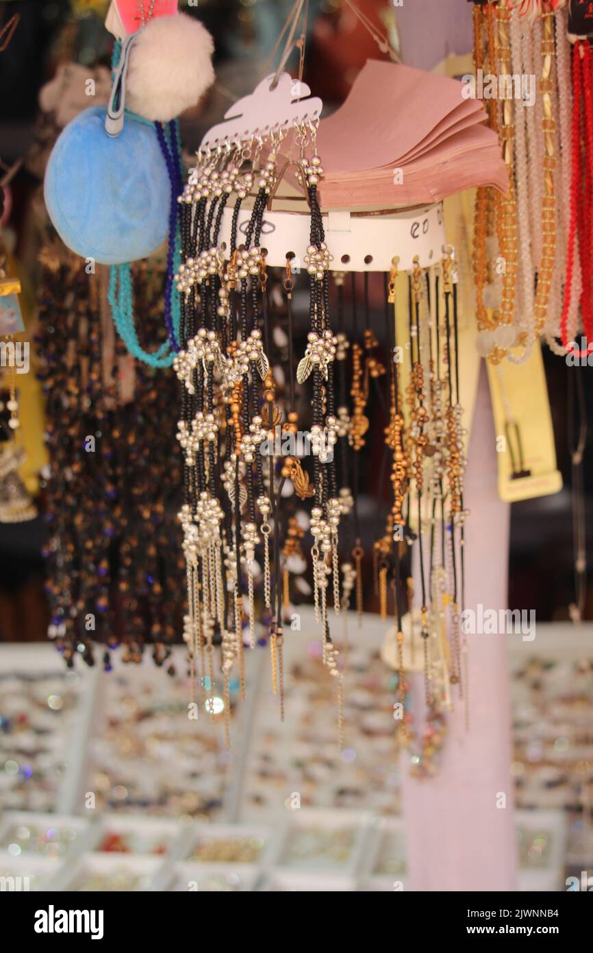 Jewelry on window display Stock Photo - Alamy