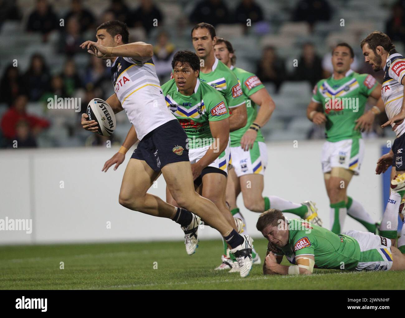 James Tamou gets away from Glen Buttriss during the NRL Rugby League ...