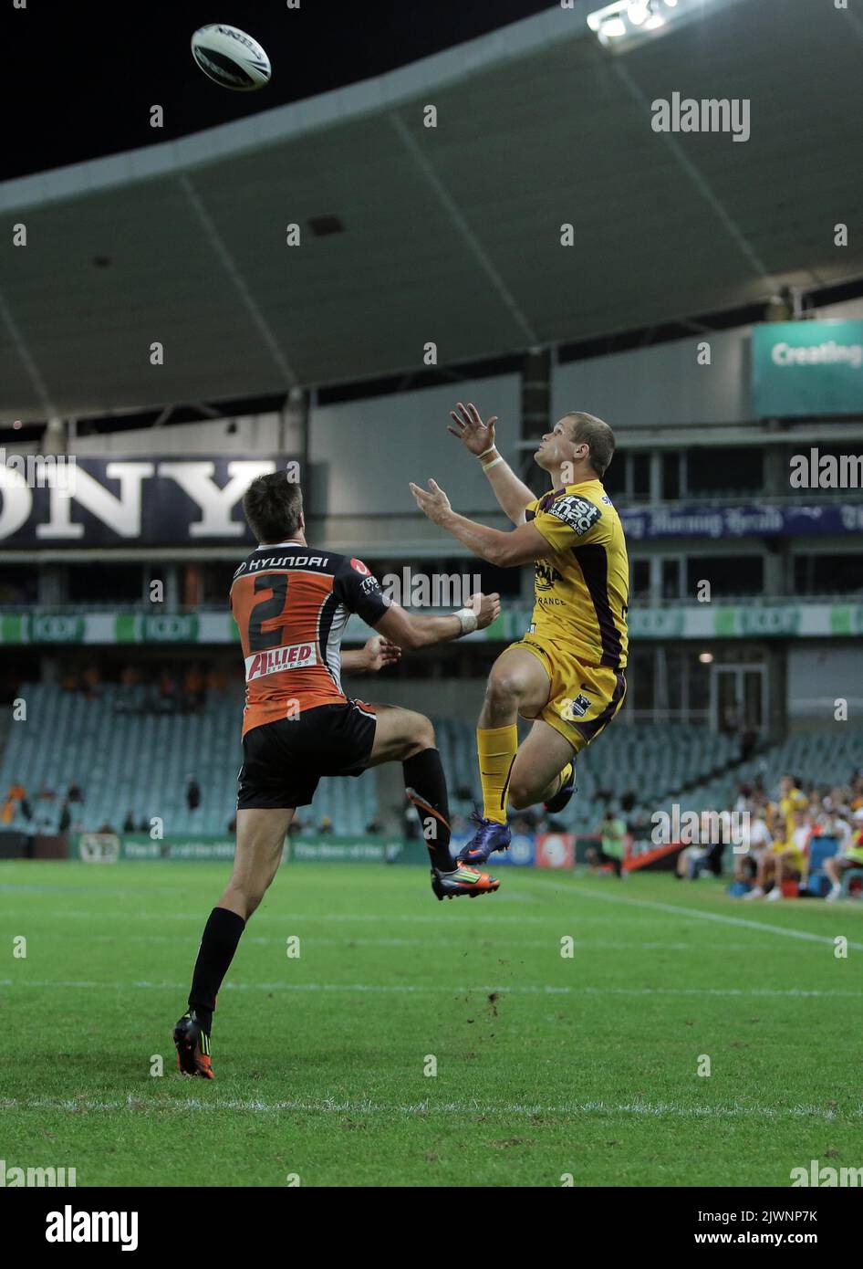 Dale Copley leaps for a cross-field kick during NRL Rugby League match ...