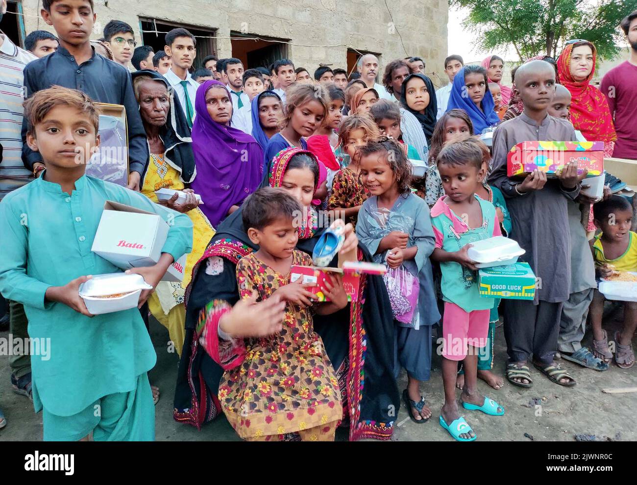 Students belonging to Sweet Home are distributing new clothes and ...