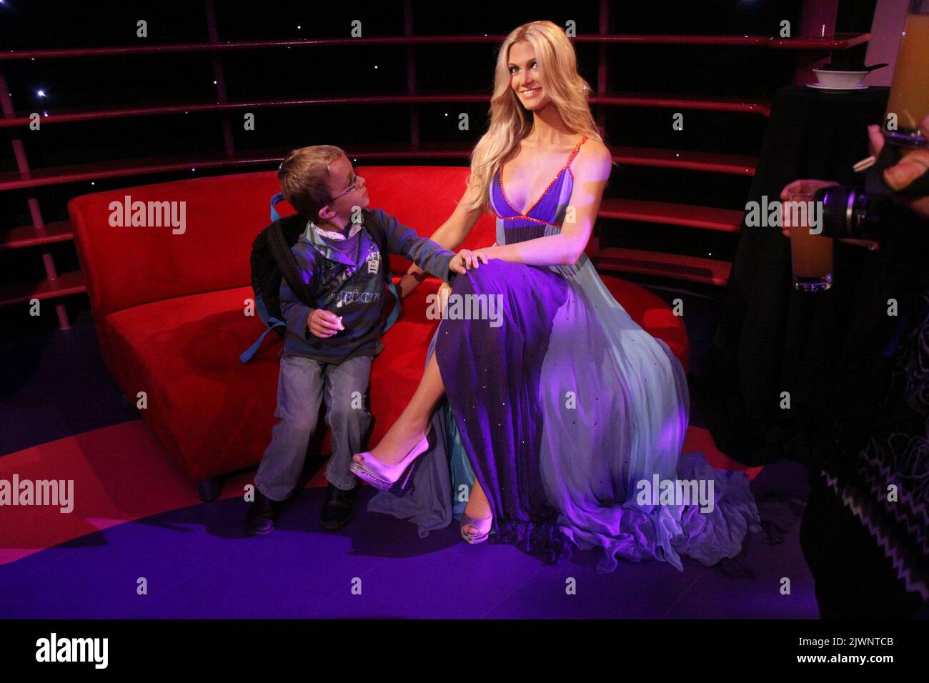 5-year-old Samuel Taylor, play with a wax figure of singer Delta ...