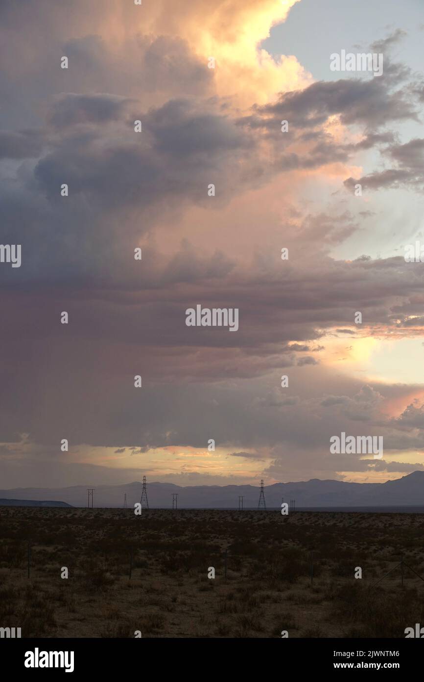 dramatic desert sky with majestic cumulus clouds Stock Photo - Alamy