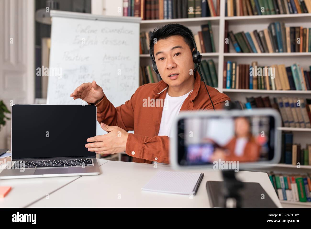 Asian Male Teacher Having Online Lecture Showing Laptop Screen Indoor ...