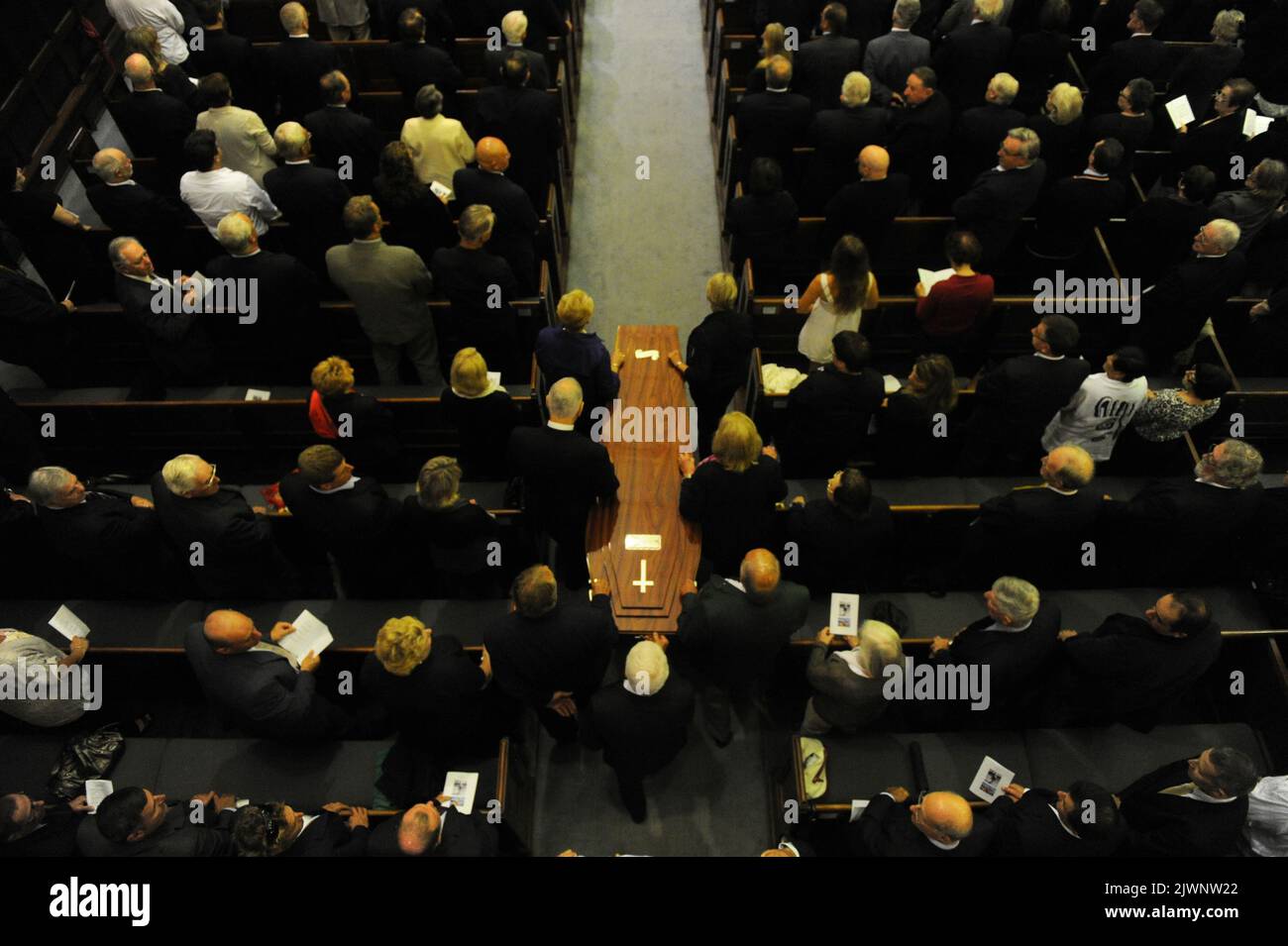 The casket of Olympic swimmer Murray Rose is carried into St. Stephens ...