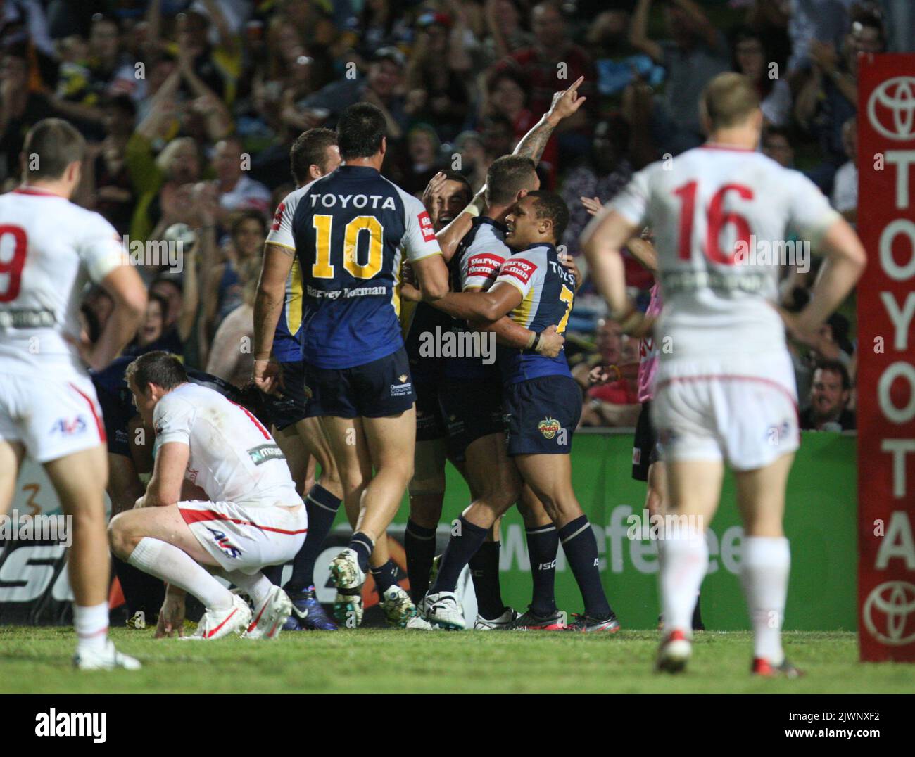 Tariq Sims salutes the crowd as the Dragons look for holes to climb ...