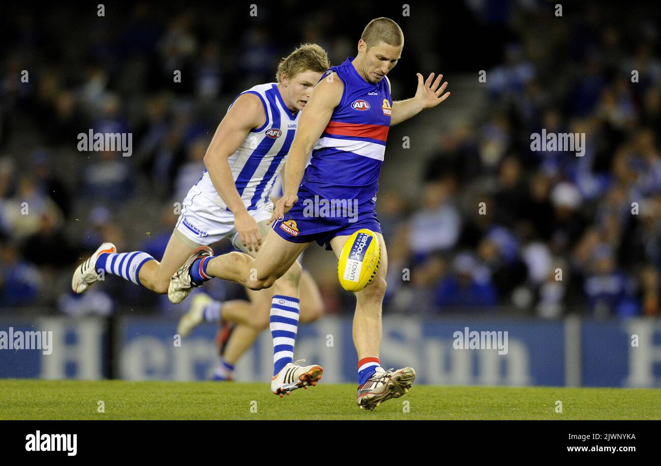 Western Bulldogs player Matthew Boyd kicks as the Bulldogs play the ...