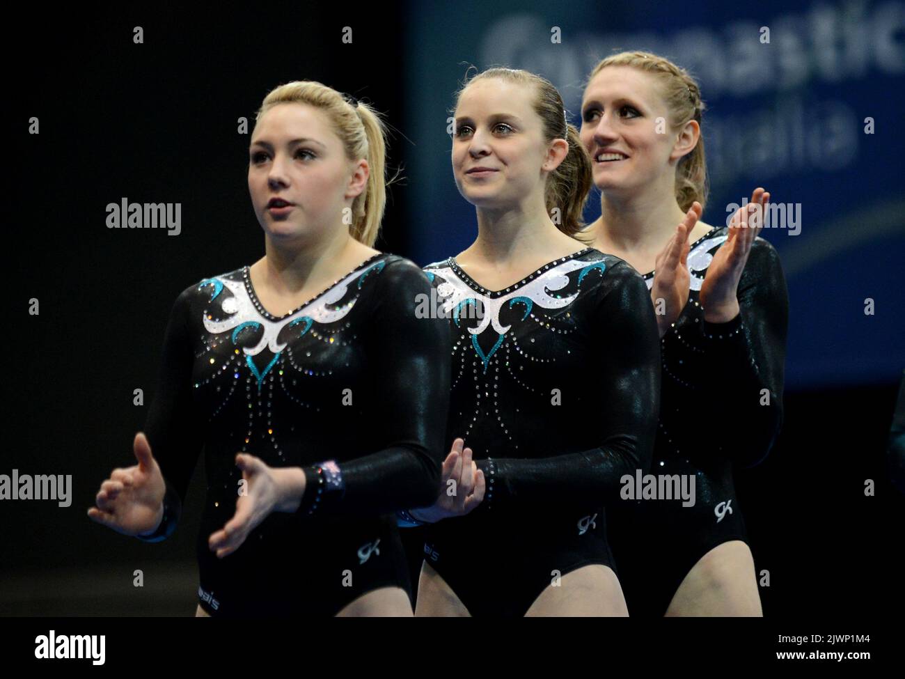 Australian gymnast Lauren Mitchell of WA (centre) Emily Little (left ...