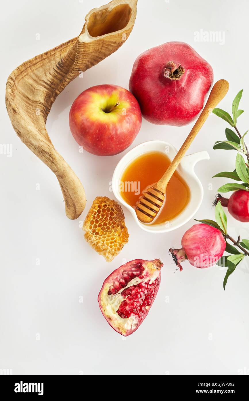 Rosh hashanah, jewish New Year holiday concept. Pomegranate, apples and ...