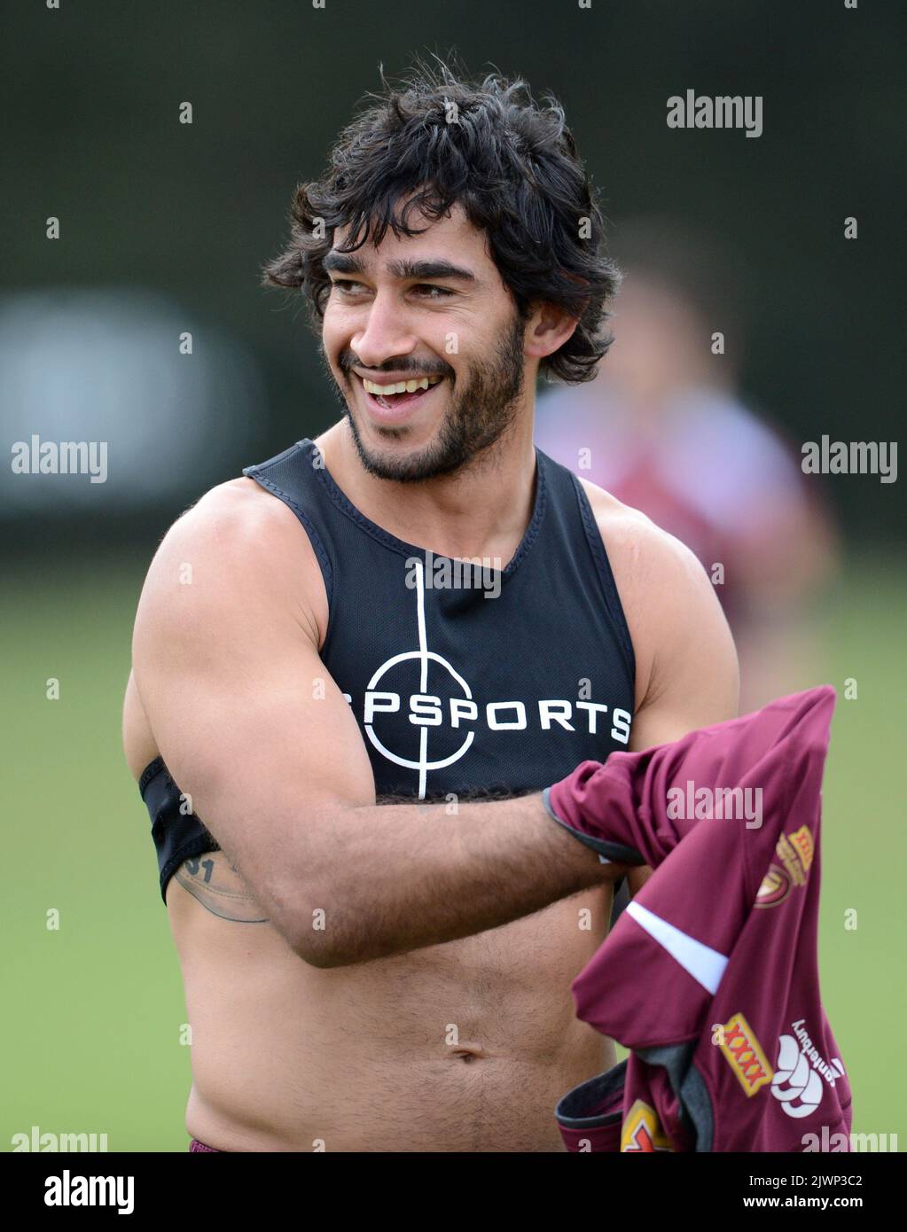 Queensland State of Origin team player Johnathon Thurston puts on his ...