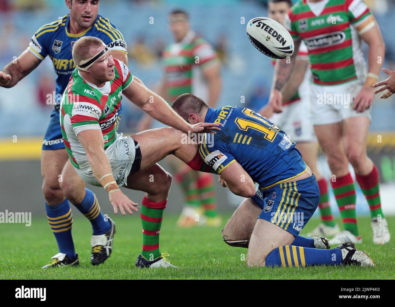 Mick Crocker passes during NRL Round 15 match between Parramatta Eels ...