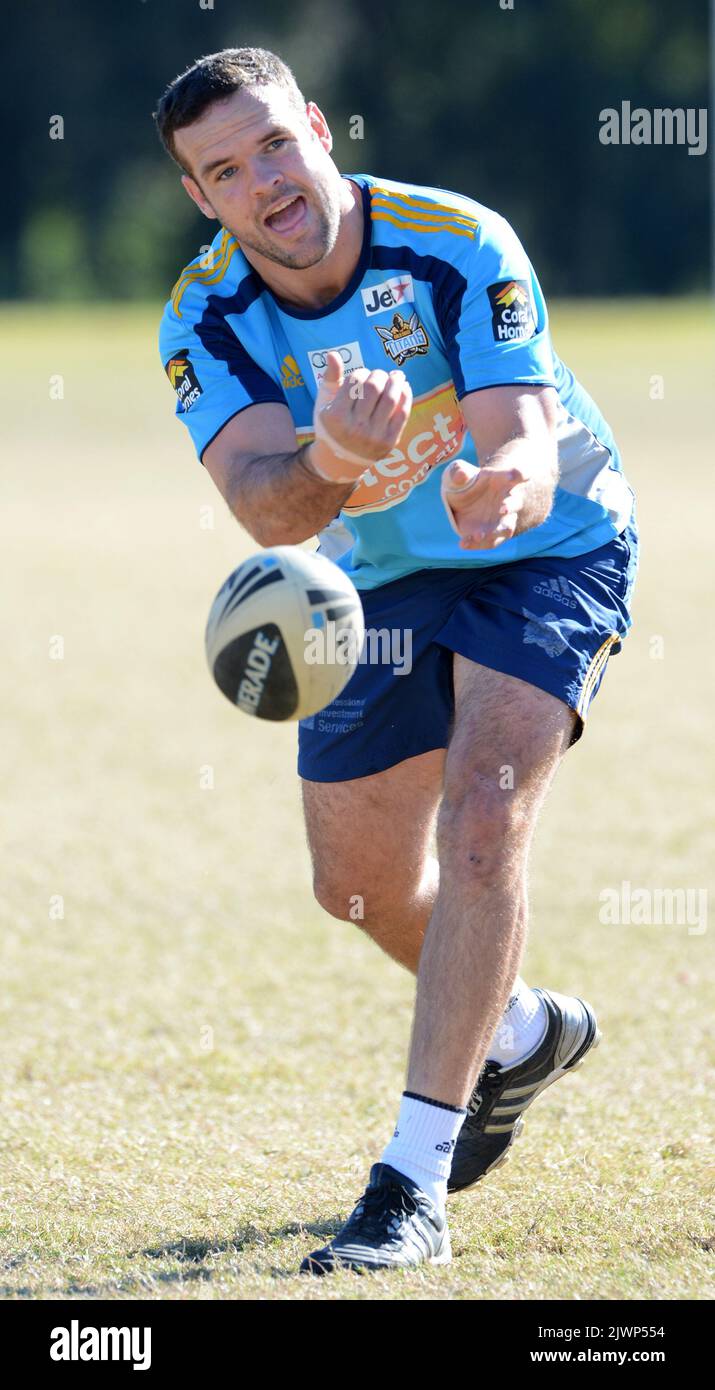 Nate Myles passes the ball during the Gold Coast Titans training ...