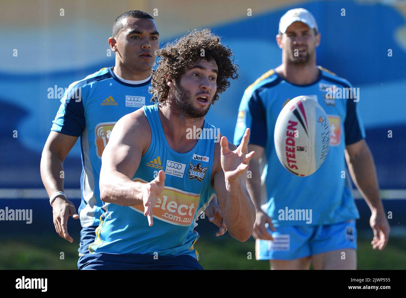 Ben Ridge passes the ball during the Gold Coast Titans training session ...