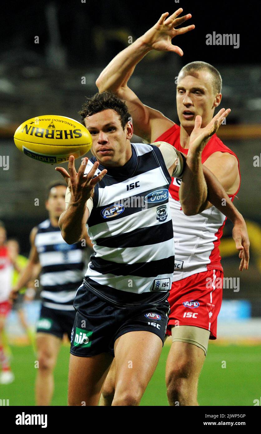 Sydney Swans Ted Richards tackles Geelong Cats Steven Motlop during ...