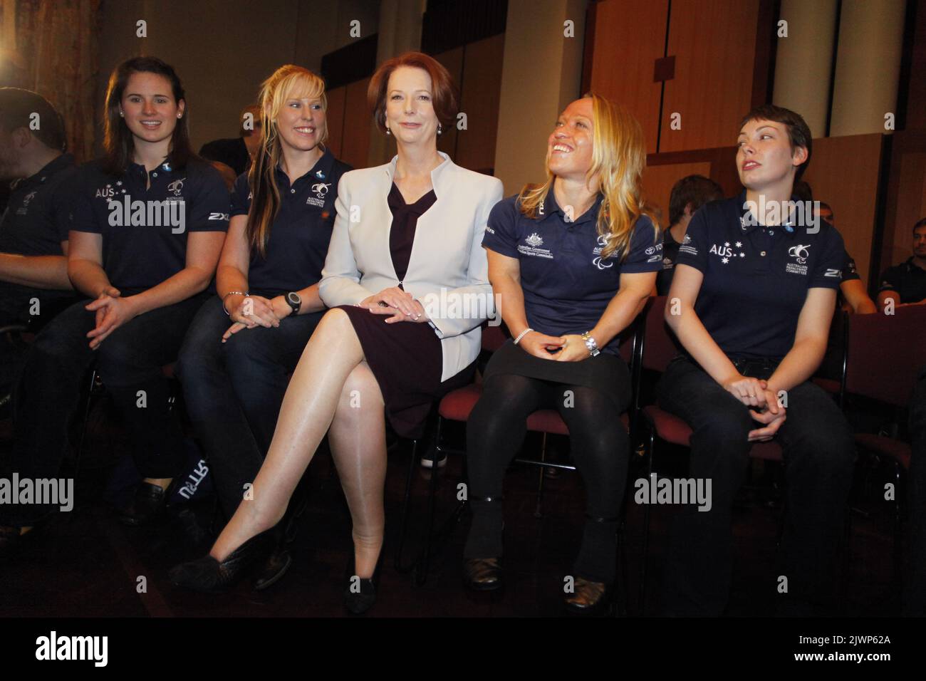 Prime Minister Julia Gillard (centre) speaks to (L to R) Bridie Kean ...
