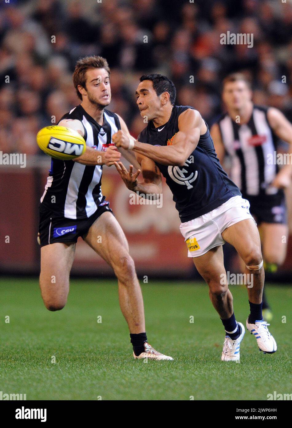 Alan Toovey of Collingwood tackles Eddie Betts of Carlton, during their ...