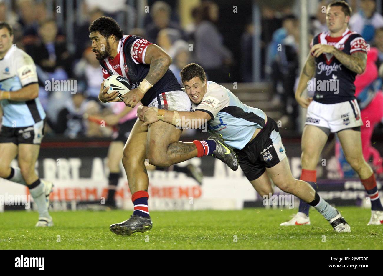 Mose Masoe attacks during the round 18 NRL match between the Cronulla ...